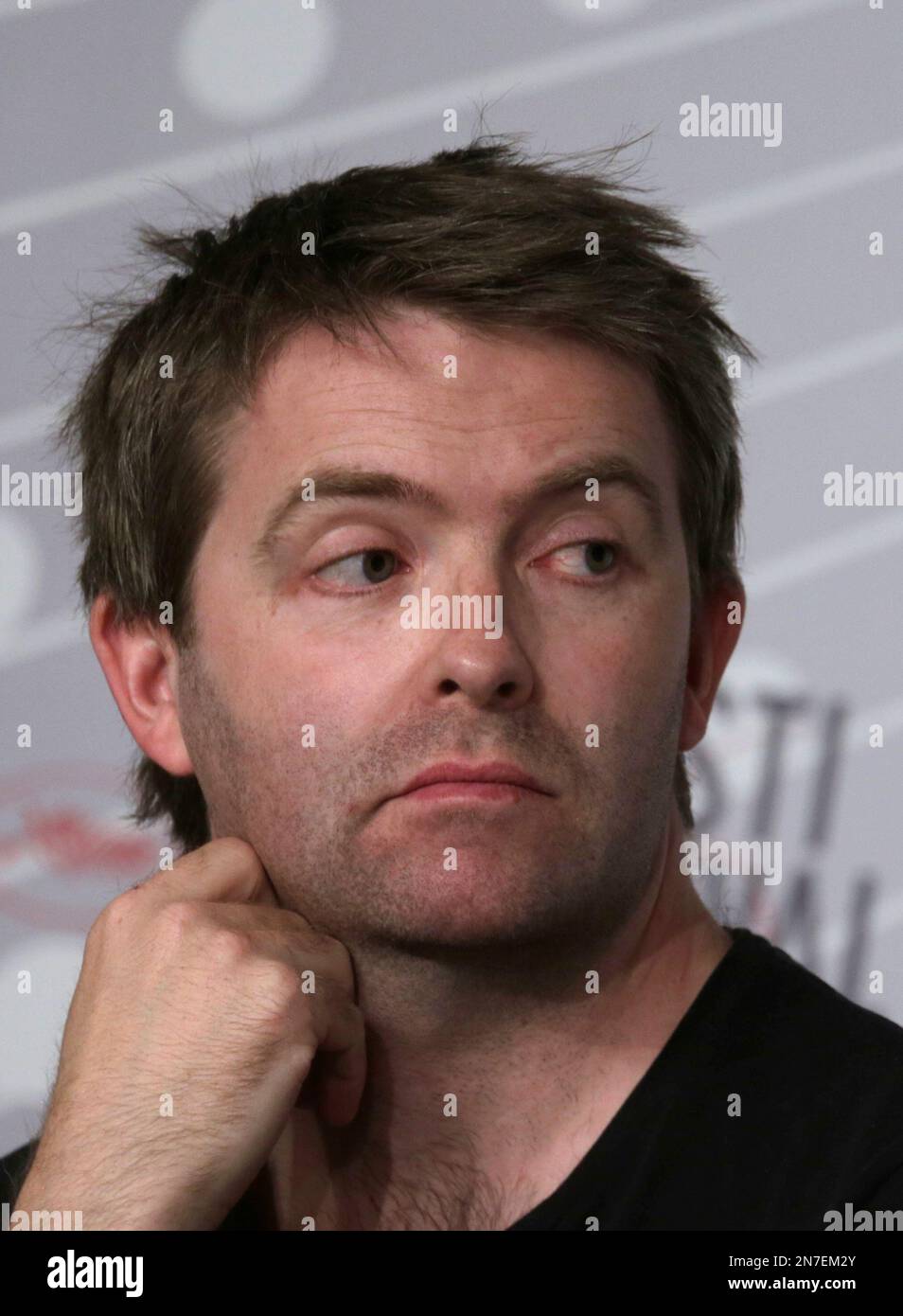 Actor Matthew Newman listens during a press conference for the film ...