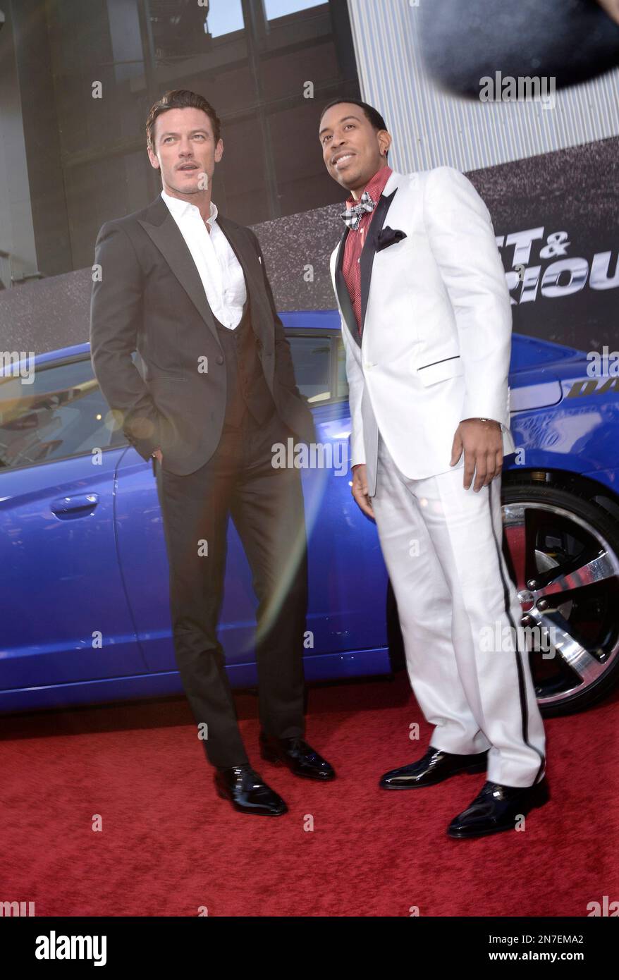 Rapper Ludacris, right, and actor Luke Evans arrive at the LA Premiere ...