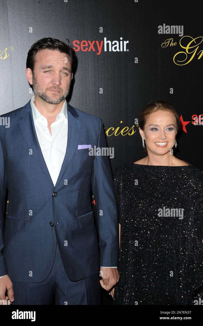Josh Roshing, at left, and Jennifer Salan arrives at the 38th Annual ...