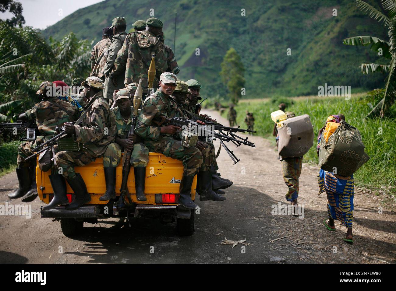 FILE - In this November 30, 2012 file photo, M23 rebels withdraw from ...