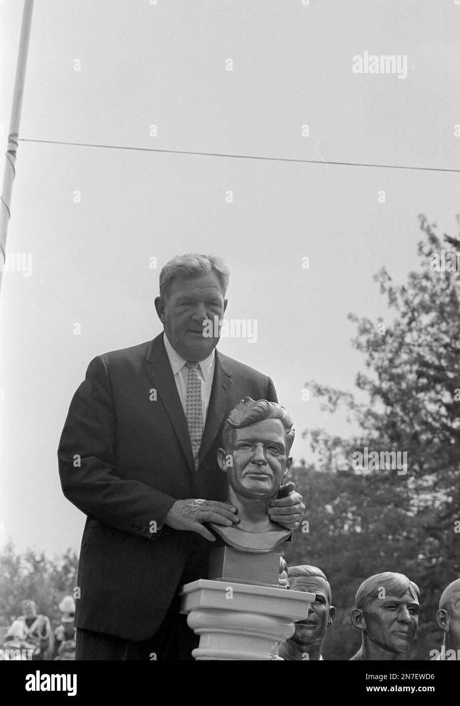 Ernie Nevers poses with bust after he was enshrined in the NFL Hall of ...