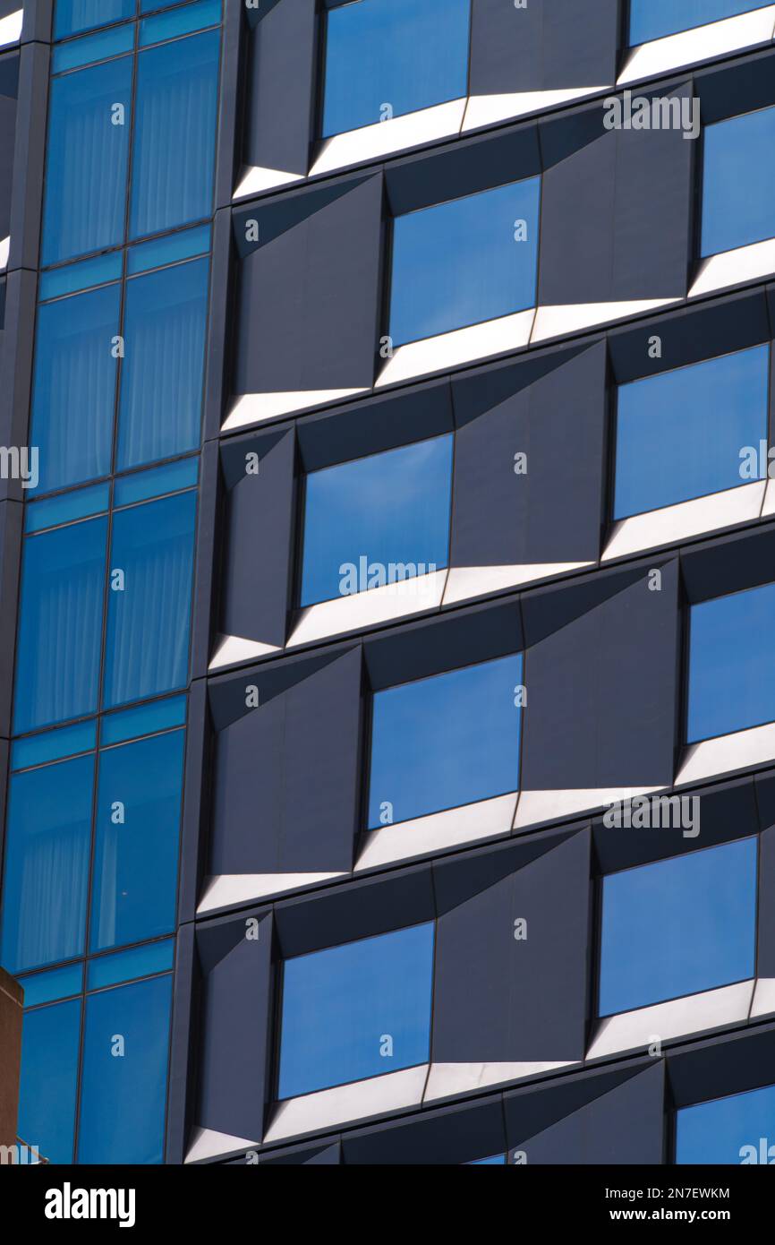 Apartment building exterior view with geometric patterns and square ...