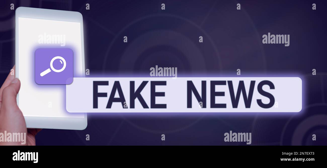 Conceptual caption Fake News. Internet Concept Giving information to ...