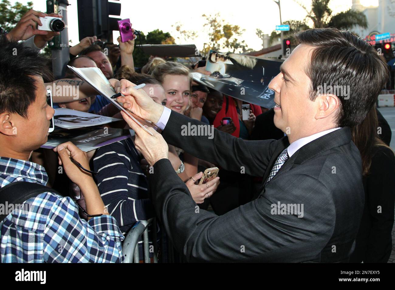 Ed Helms signs autographs at the LA Premiere of "The Hangover: Part III ...