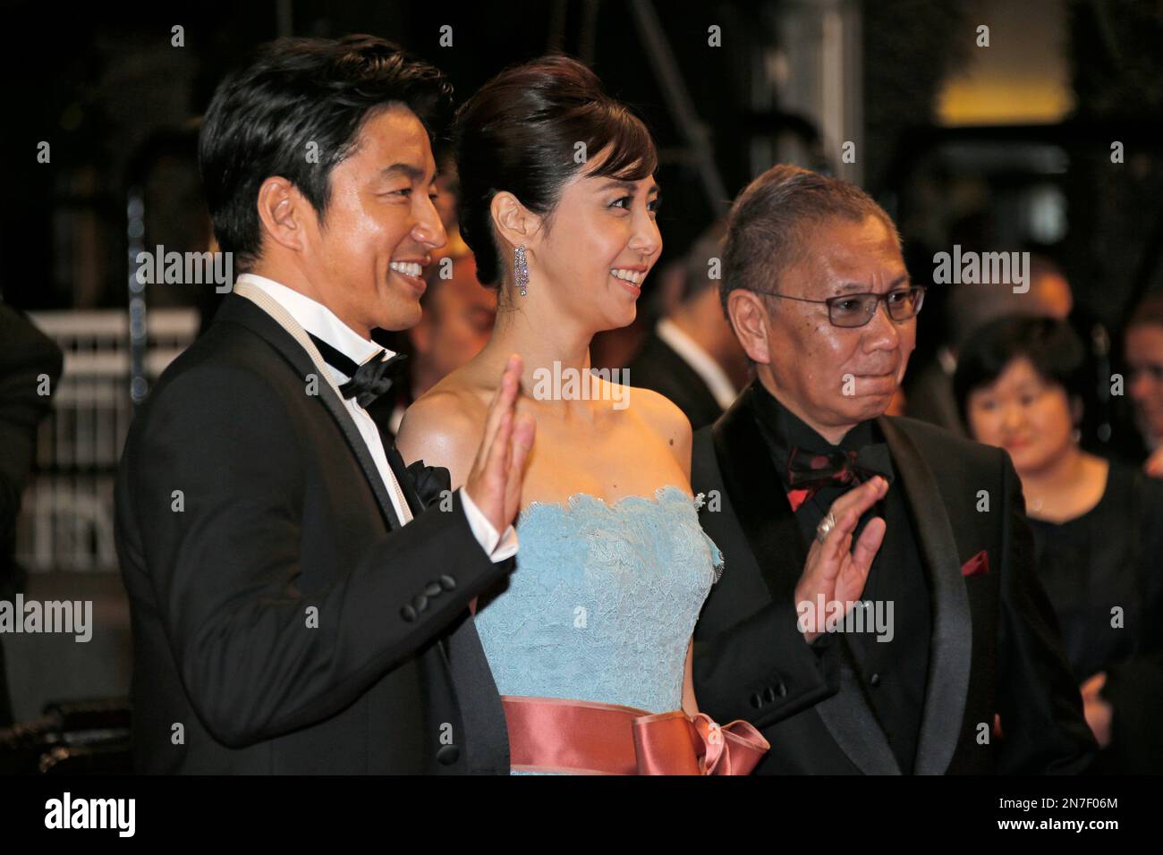 From left, Takao Osawa, Nanako Matsushima and Takashi Miike arrive for ...