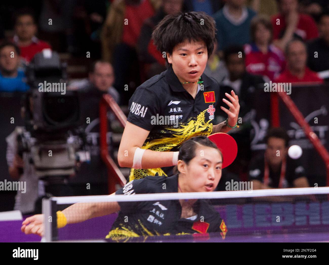 Guo Yue, and Li Xiaxia, bottom, of China compete with compatriots ...