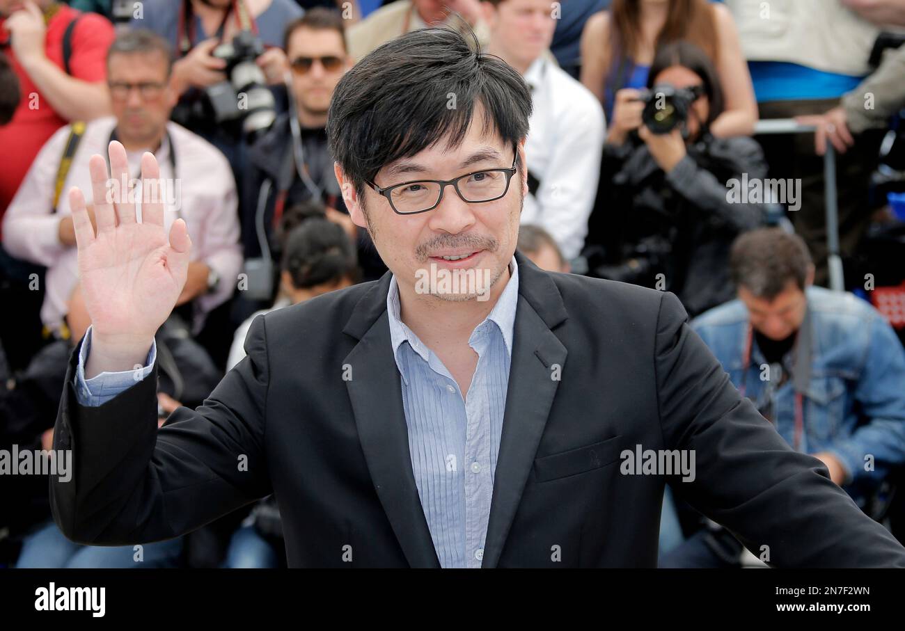 Actor Wai Ka-fai poses during a photo call for the film Blind Detective ...