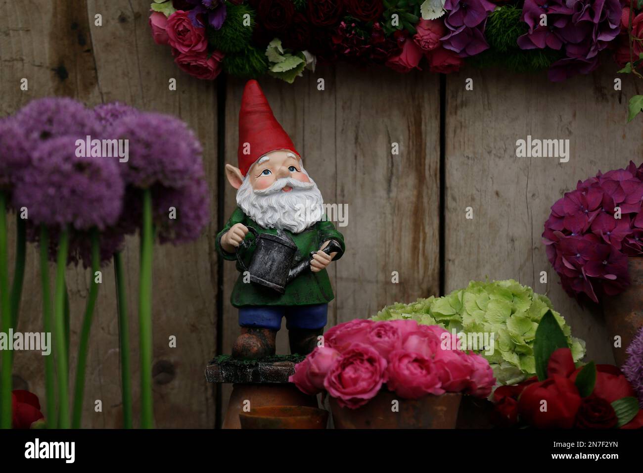 A garden gnome is seen at a flower display stand during the Chelsea ...