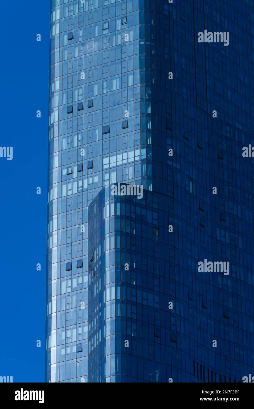 Glass office exterior view building with open and closed windows and a ...