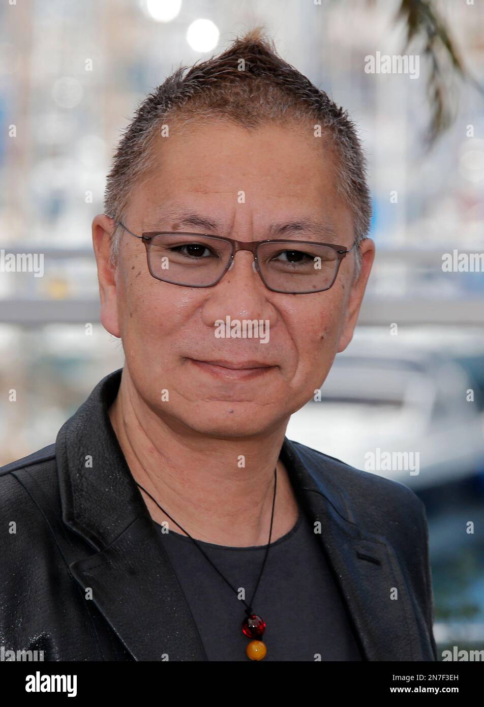 Director Takashi Miike poses for photographers during a photo call for ...