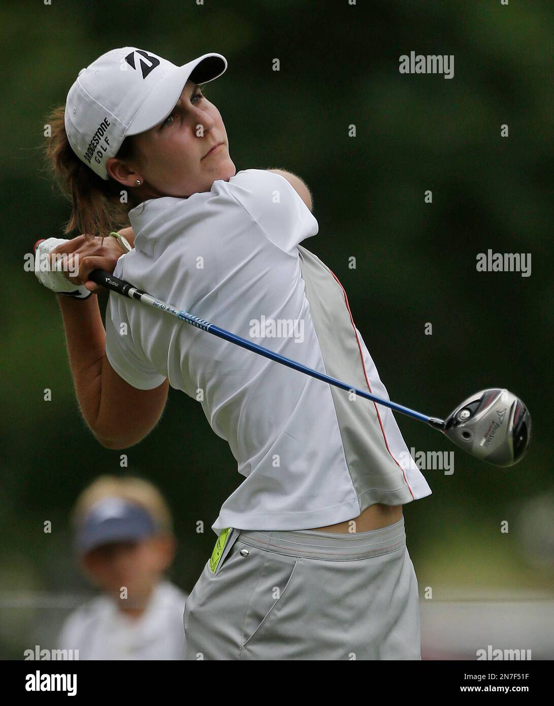 Jennifer Johnson watches her drive from the first tee during the final ...