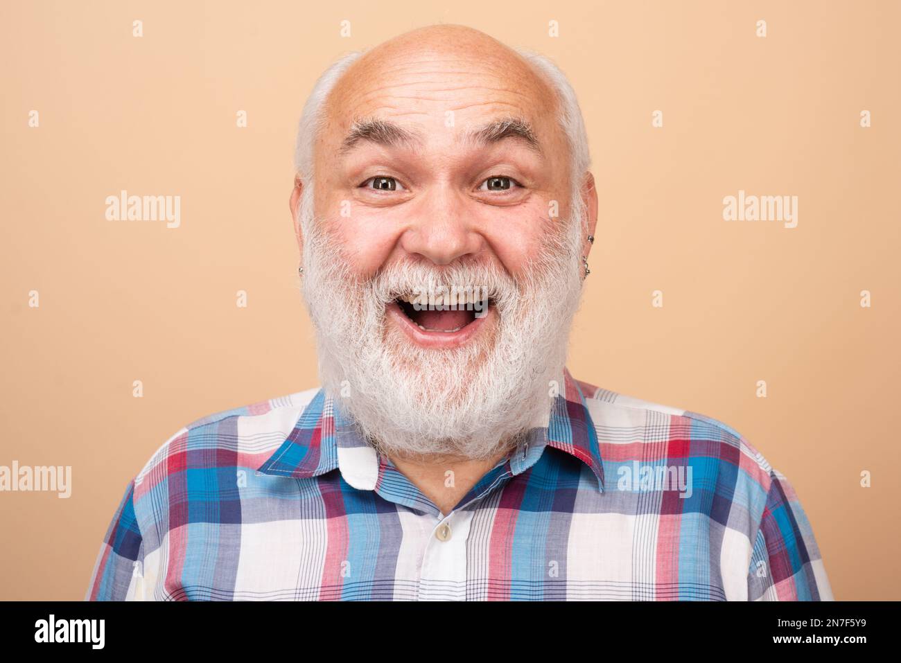 Face of 50s aged pensioner. Portrait of happy senior man smiling. Closeup emotional portrait of ...