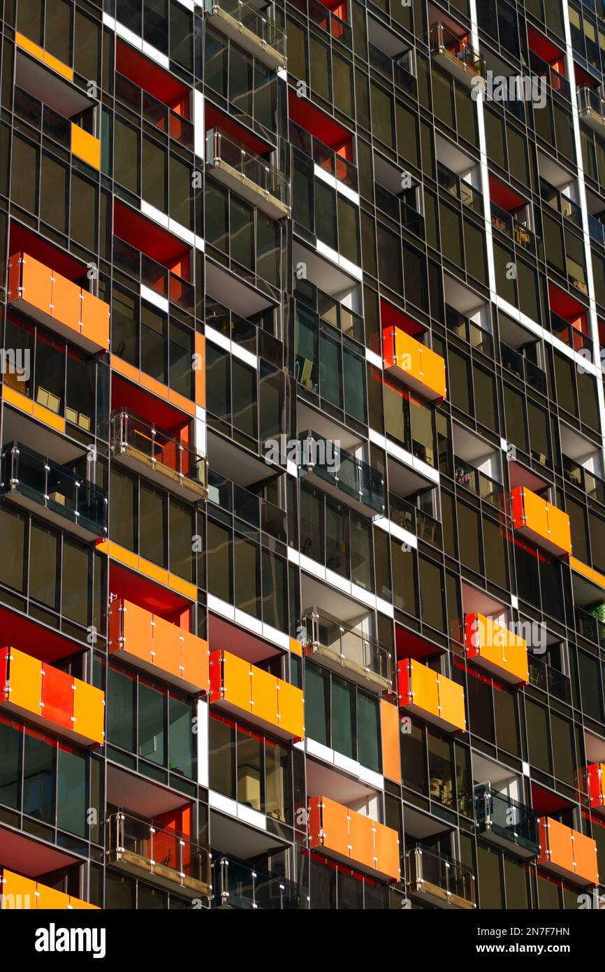 Apartment building exterior view showing glass windows and balconies ...