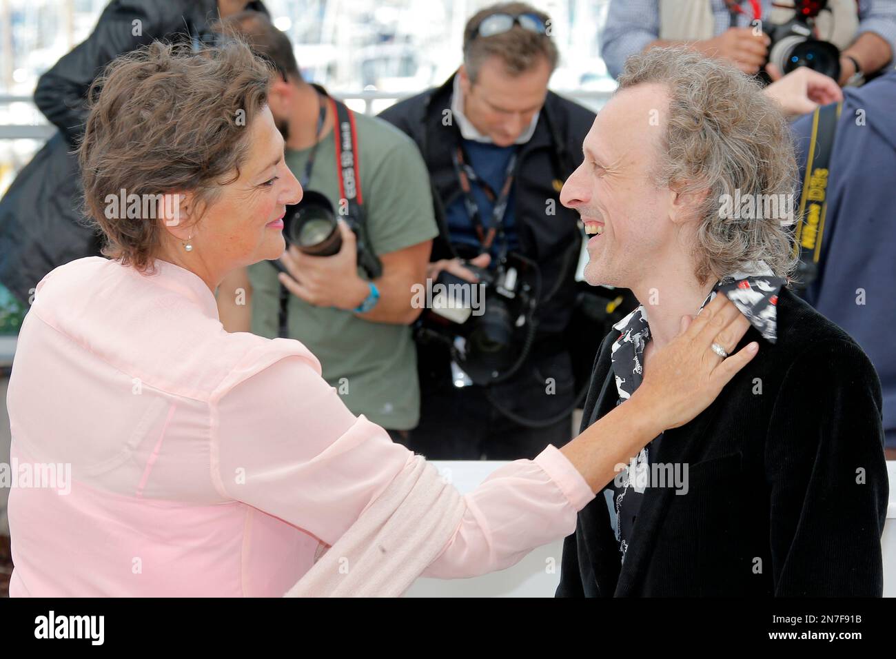 Actors Annet Malherbe, left, and Jan Buvoet pose for photographers ...