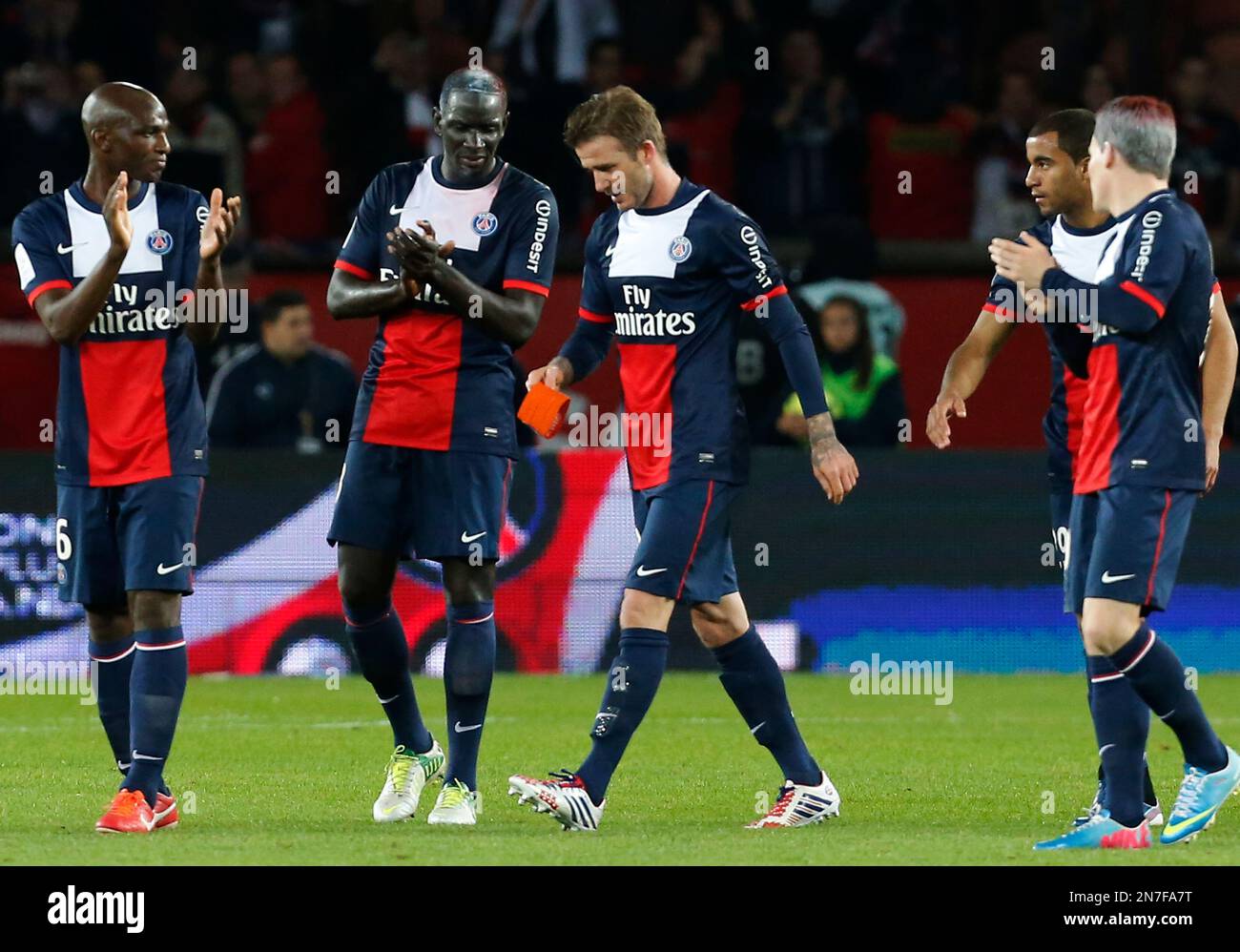 Paris Saint-Germain's midfielder David Beckham, center, from England ...