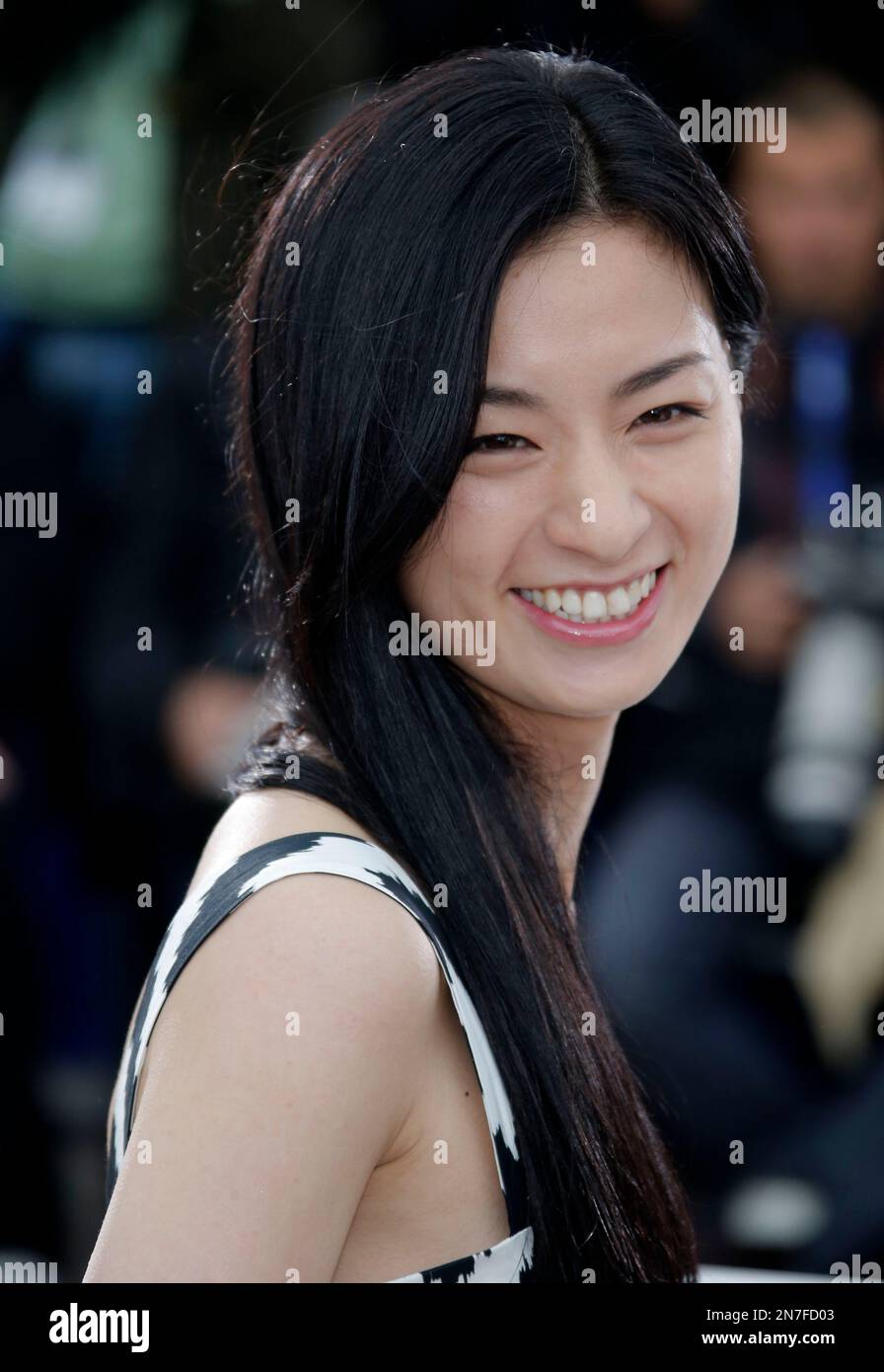 Actress Machiko Ono poses during a photo call for the film Like Father ...