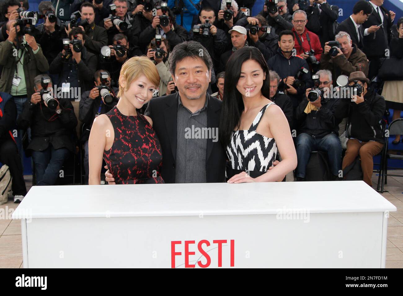From left, Yoko Maki, director Hirokazu Kore-eda and actor Machiko Ono ...