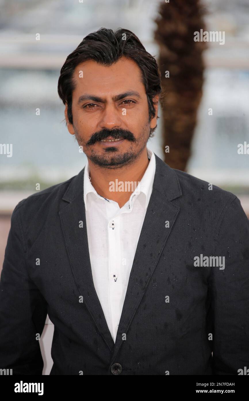 Actor Nawazuddin Siddiqui poses for photographers during a photo call ...