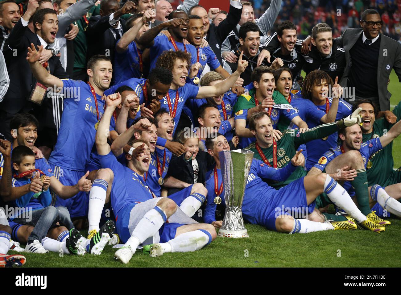 Chelsea players pose for a team photo with the trophy as they celebrate ...