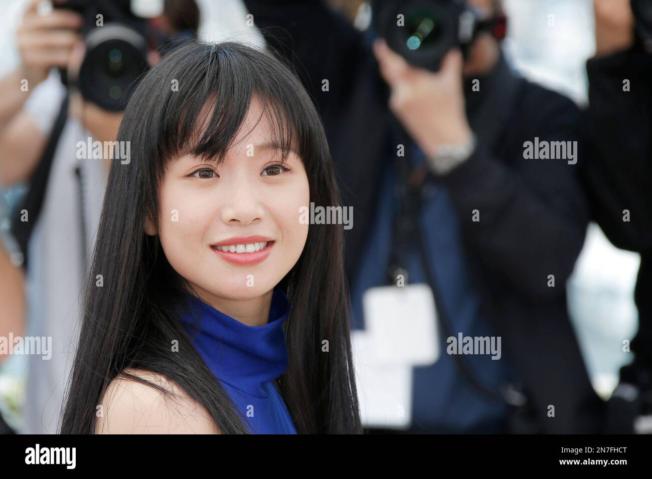 Actress Meng Li poses for photographers during a photo call for the ...