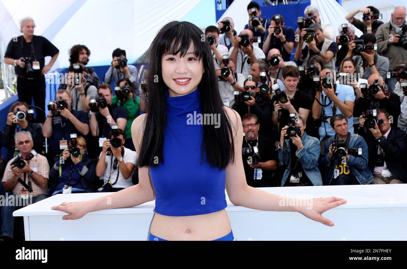 Actress Meng Li poses for photographers during a photo call for the ...