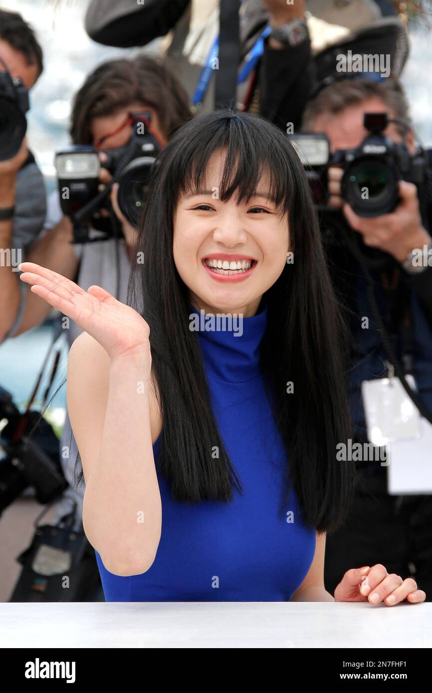 Actress Meng Li blows a kiss to photographers as she poses during a ...