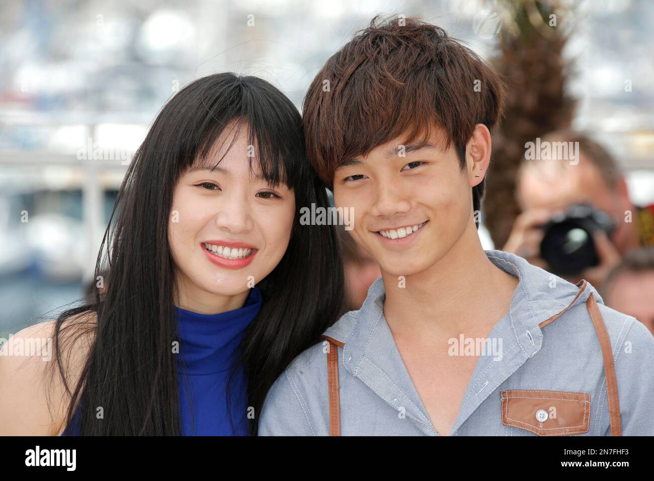Actors Meng Li, left, and Lanshan Luo pose for photographers during a photo call for the film A ...