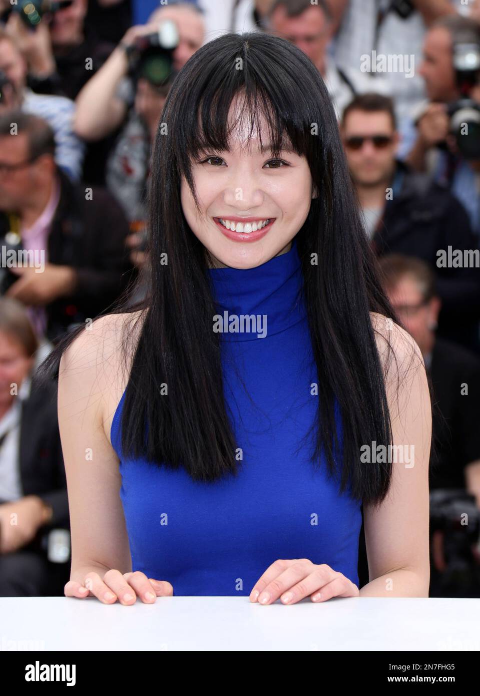 Actress Meng Li poses for photographers during a photo call for the ...