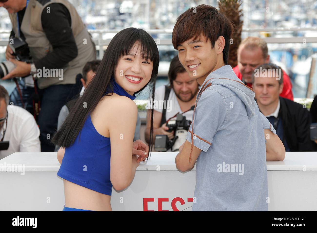 Actors Meng Li, left, and Lanshan Luo pose for photographers during a ...