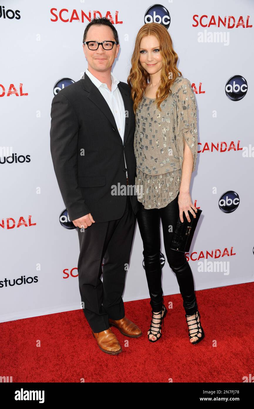 Joshua Malina, left, and Darby Stanchfield arrive at the Academy of ...