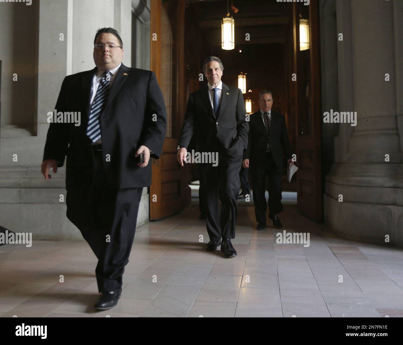 Andrew Ball, left, New York Gov. Andrew Cuomo, center, and Howard ...