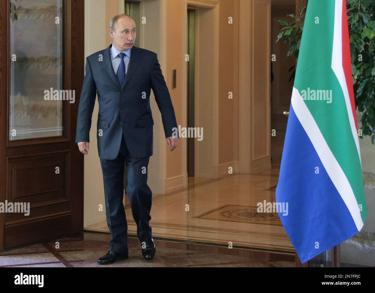 Russian President Vladimir Putin arrives to greet South African ...