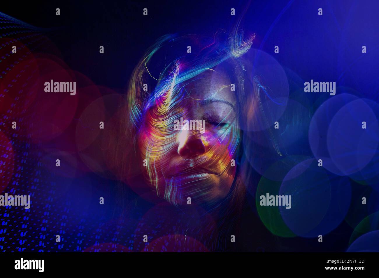 Face of a woman with light effects from light painting. Concept of ...