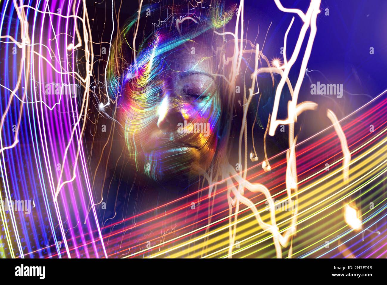 Face of a woman with light effects from light painting. Concept of ...