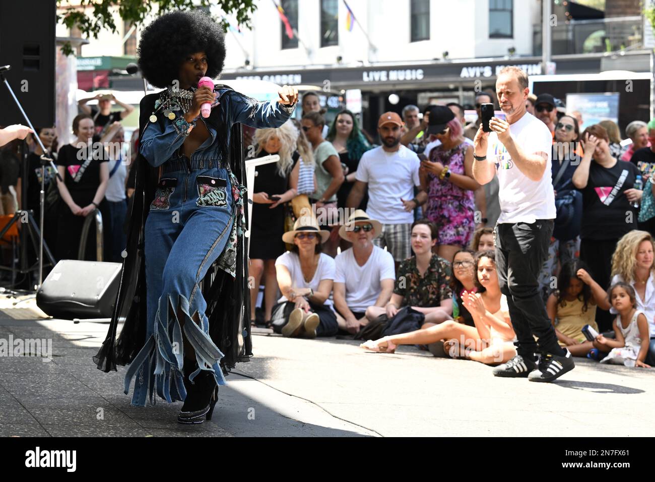 Drag artist Malcolm X performs during the official opening of Pride ...