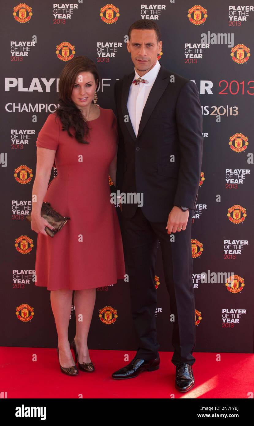 Manchester United's Rio Ferdinand arrives with his wife Rebecca Ellison ...