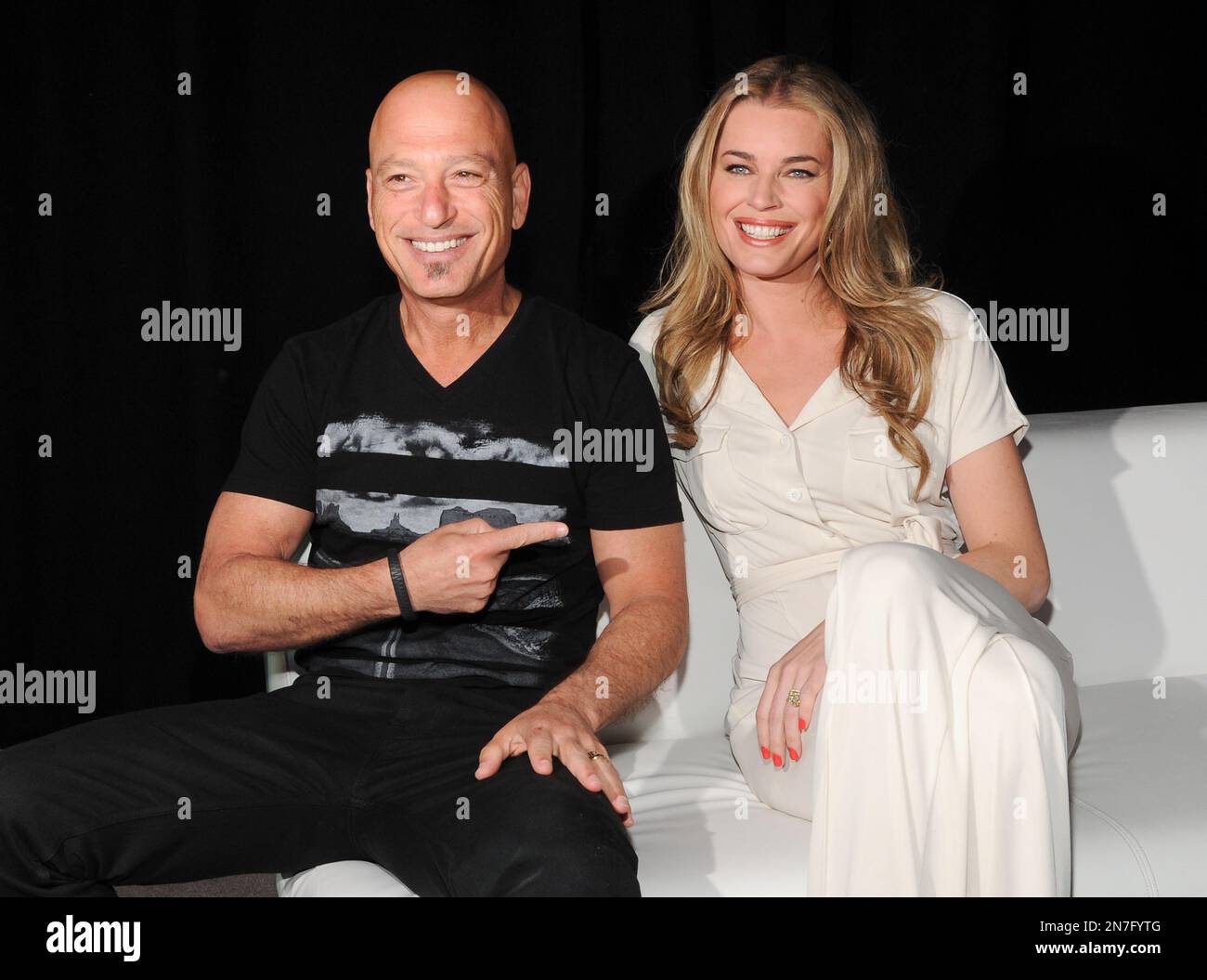 Howie Mandel and Rebecca Romijn attend the TNT and TBS 2013 Upfront at ...