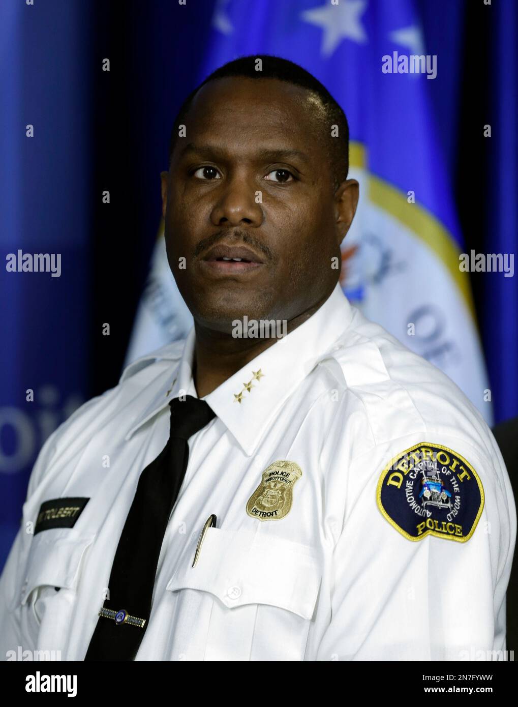 Detroit Police Department Deputy Chief James Tolbert listens as James ...