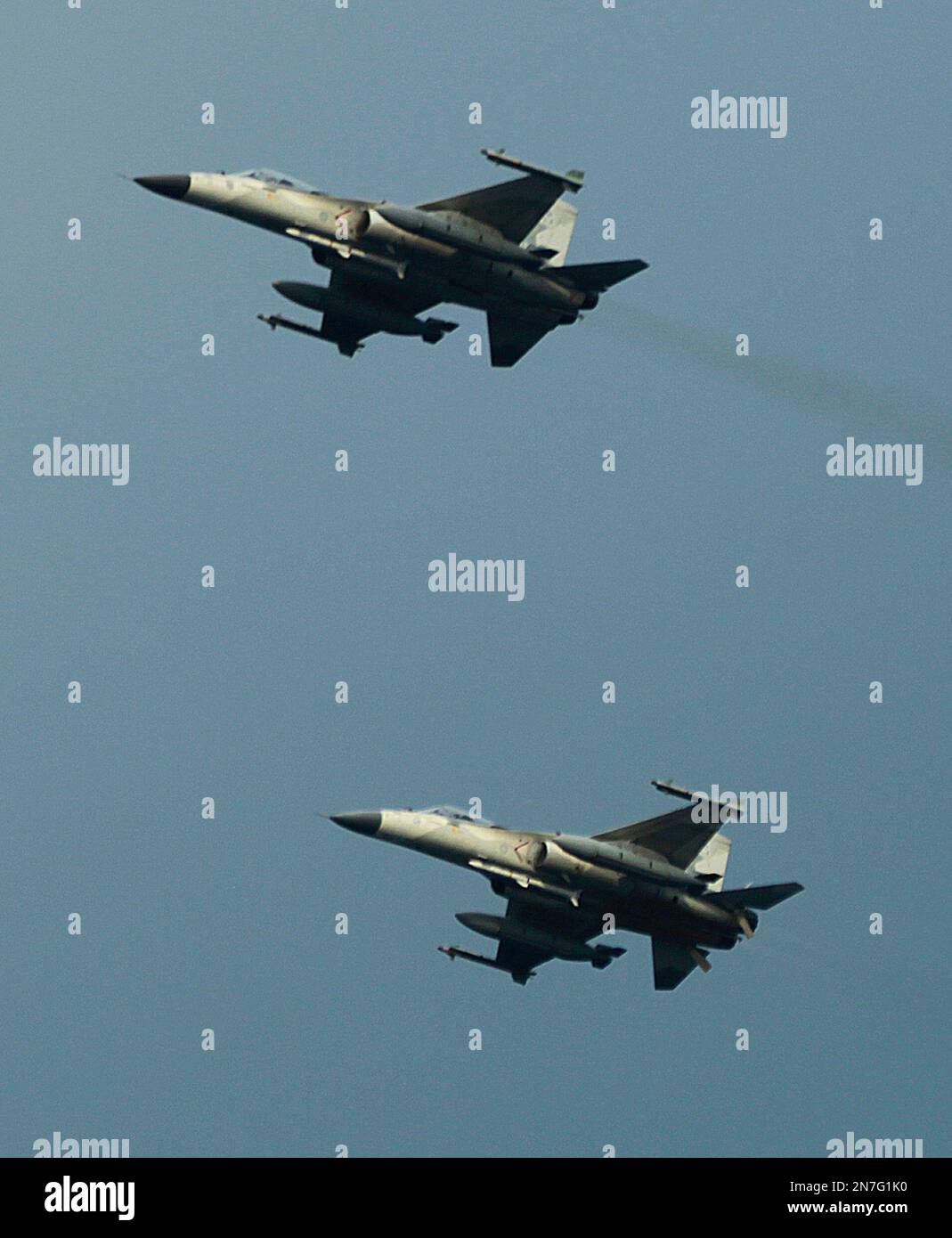 Two Taiwanese IDF fighters fly over a Taiwanese Kidd-class destroyer ...