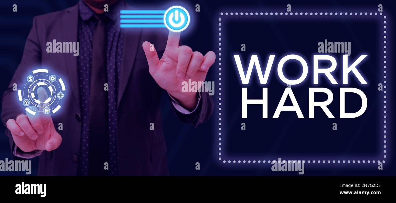 Conceptual caption Work Hard. Word Written on Laboring that puts effort ...