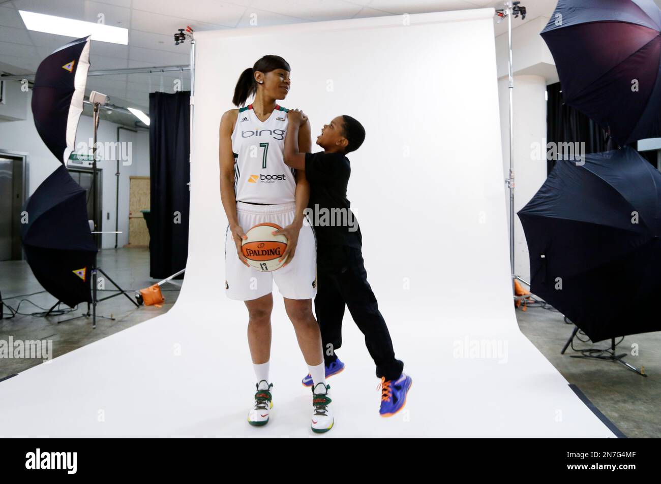 Seattle Storm's Tina Thompson is photographed with her son, Dyllan ...