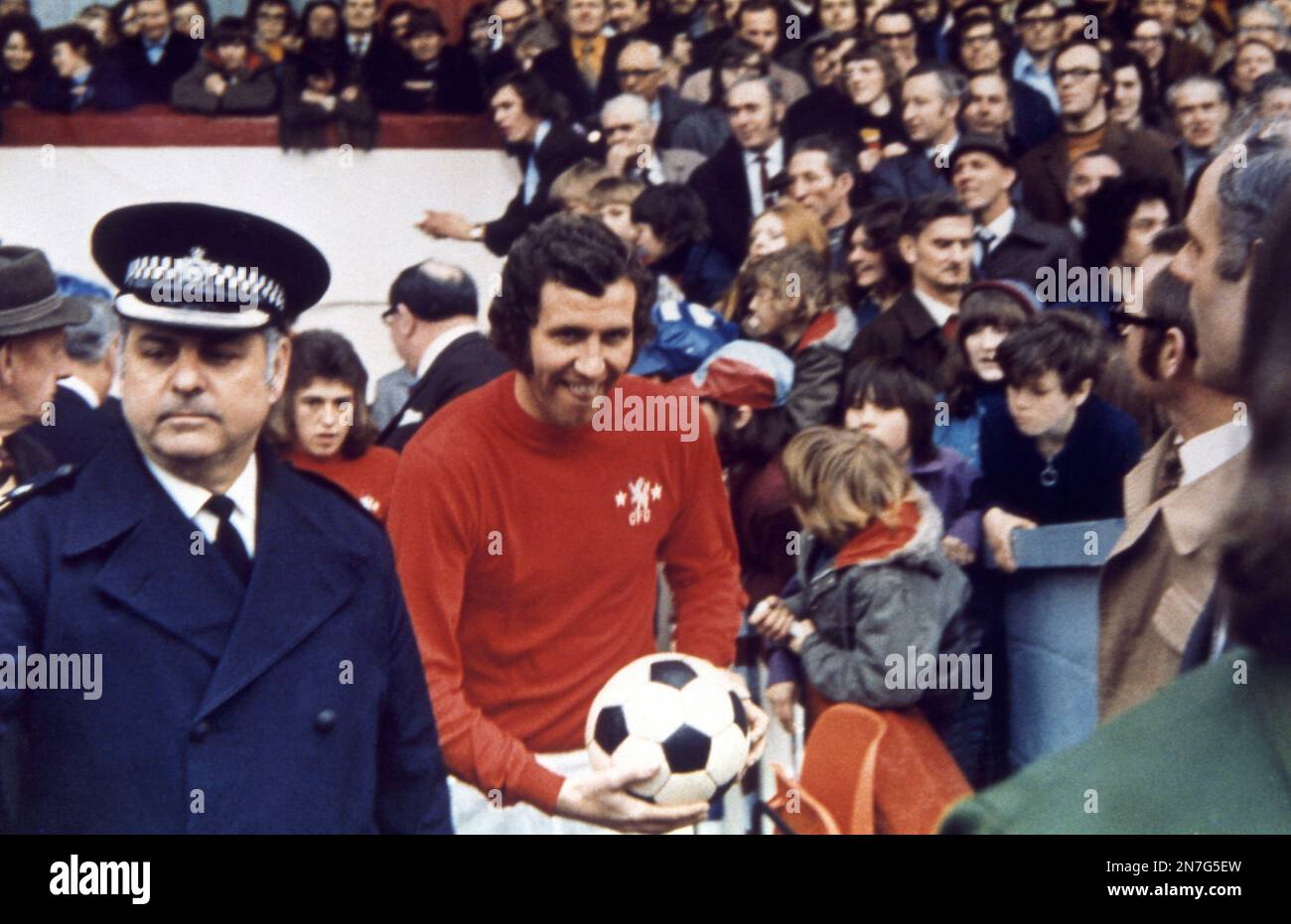 Chelsea Football Club player Peter Osgood sticks his tongue out as he ...