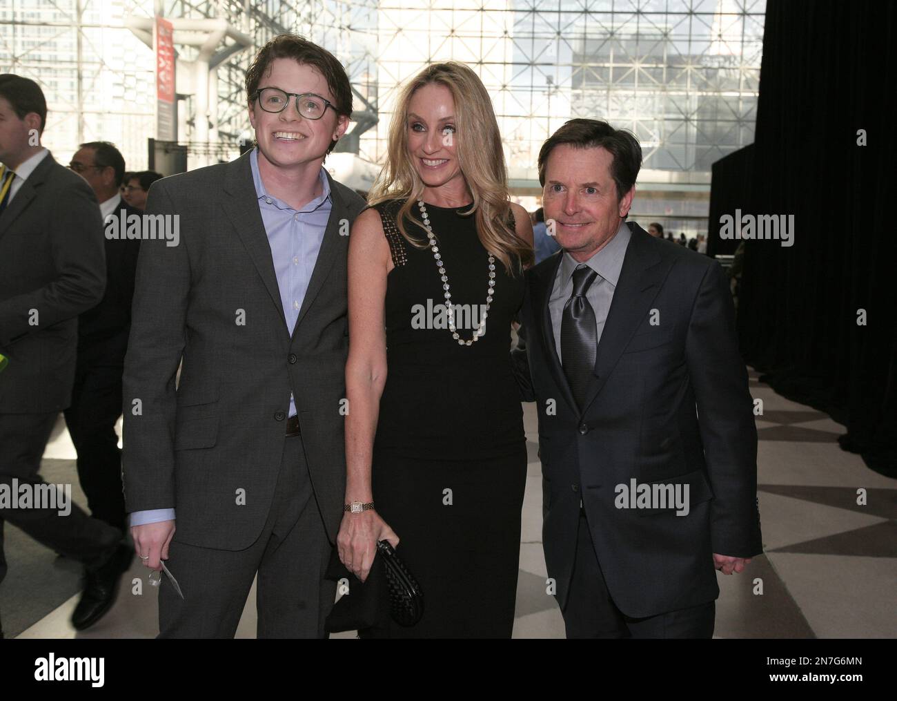 Actor Michael J. Fox, right, attends the Robin Hood Benefit Concert ...