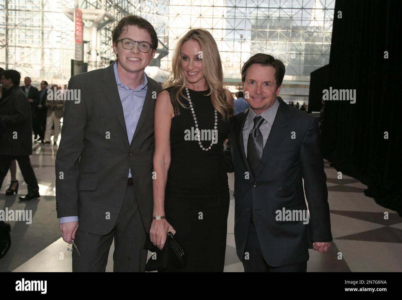 Actor Michael J. Fox, right, attends the Robin Hood Benefit Concert ...