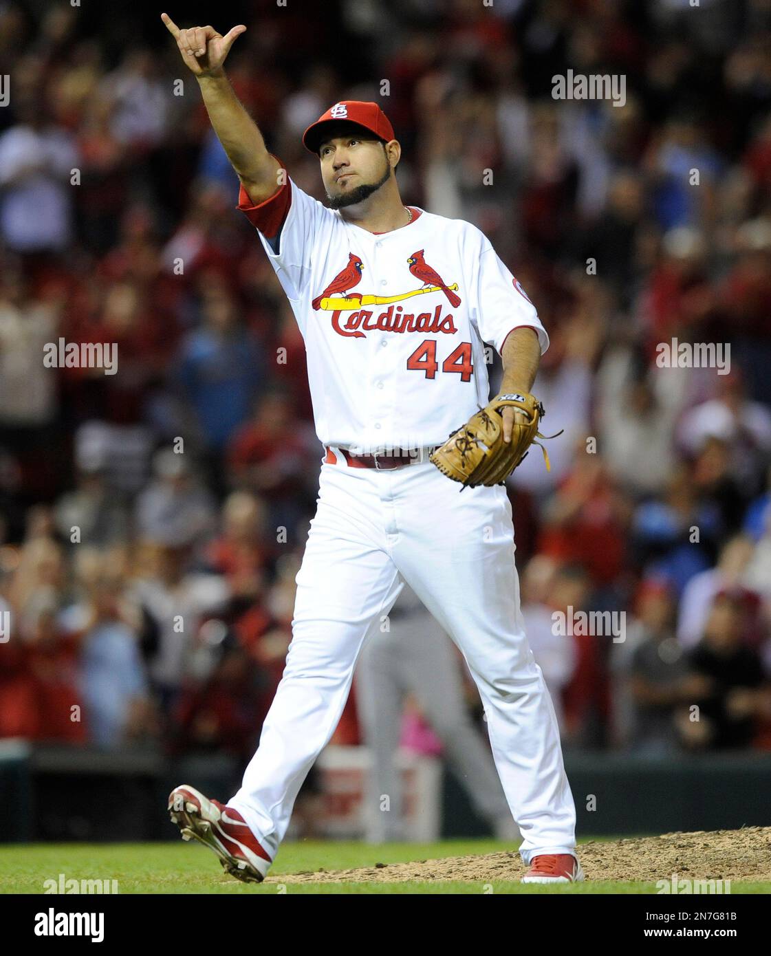 St. Louis Cardinals' Edward Mujica celebrates after the victory over ...