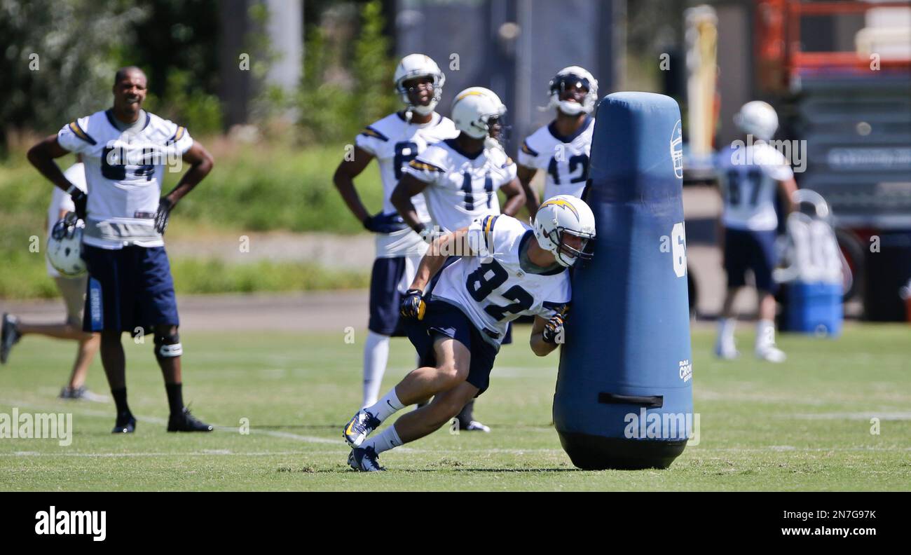San Diego Chargers receiver Dan De Palma runs around a tackling dummy ...