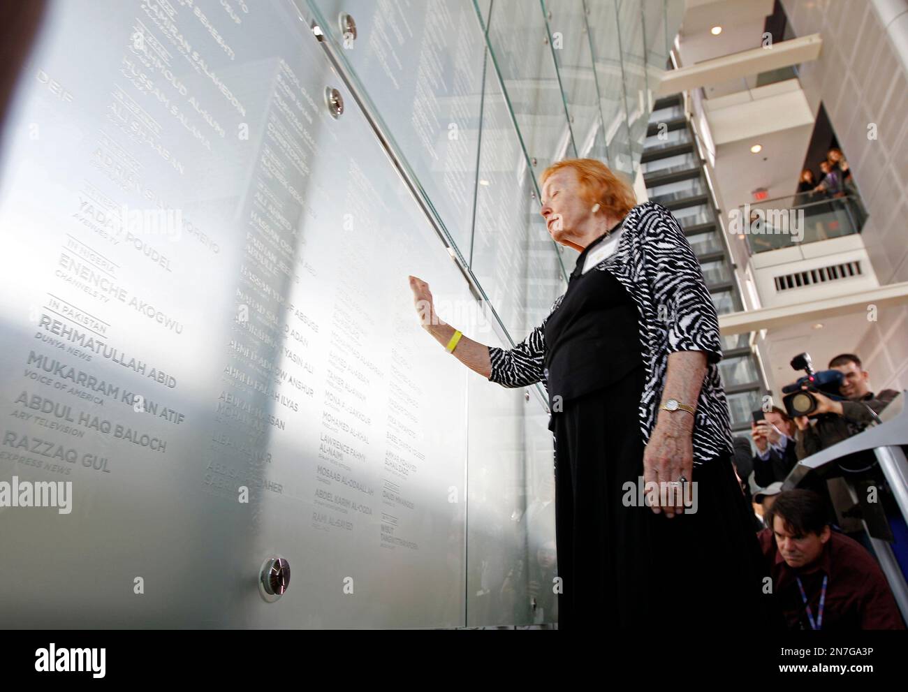 Rosemary Colvin touches the name of her daughter, journalist Marie ...