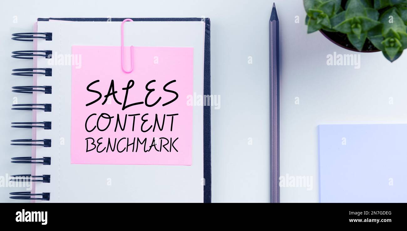 Sign displaying Sales Content Benchmark. Concept meaning manage their ...