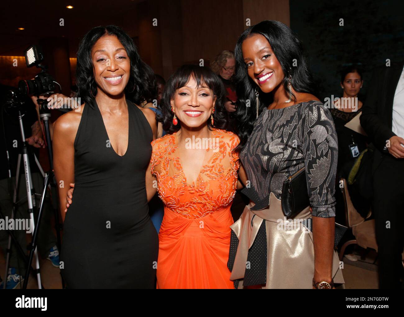 Robbie Reed, Dr. Pearl Grimes and guest arrive at CARRY Foundation's ...