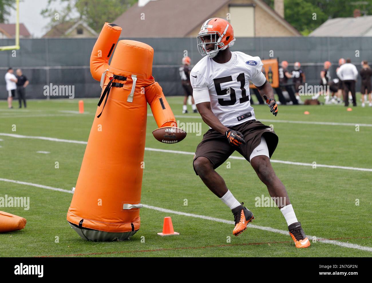 Cleveland Browns linebacker Barkevious Mingo works on a rushing drill ...